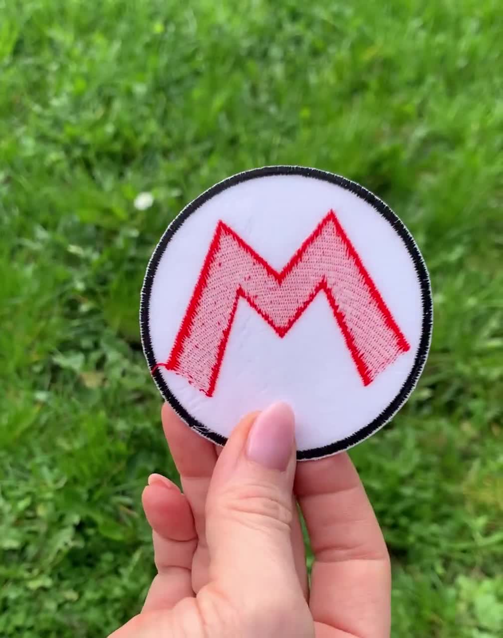 Super Mario M Logo